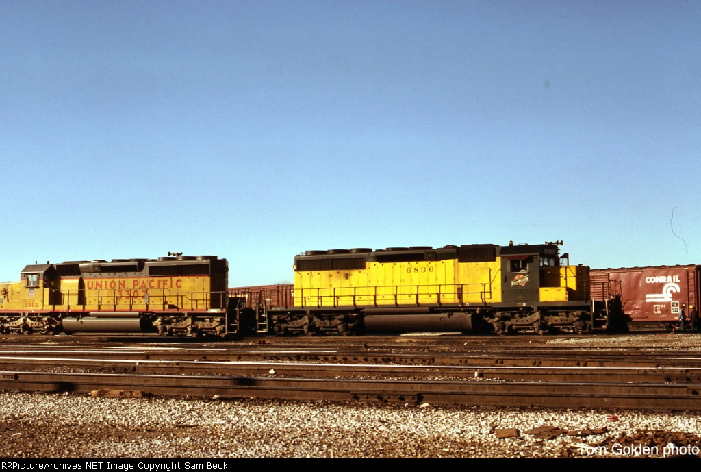 CNW 6836 and UP 3302